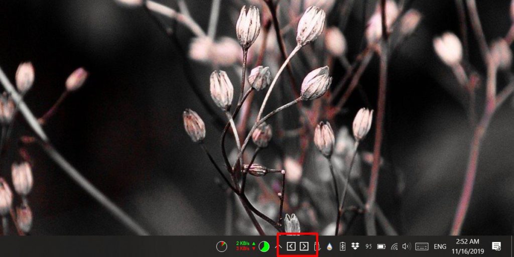 How to move to the next/previous desktop from the system tray on Windows 10